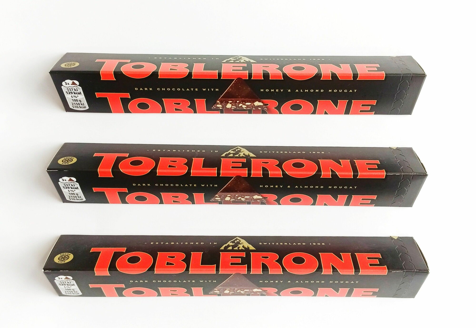 Шоколад Тоблерон Темный с медово - миндальной нугой/ Toblerone Dark with Honey & Almond Nougat, 3 шт. х 100 гр. (Швейцария)