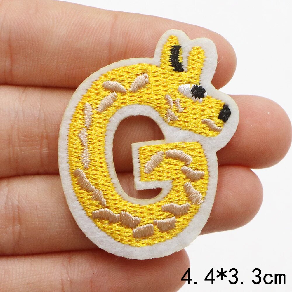 Желтая нашивка с буквой G, 4.4*3.3 см