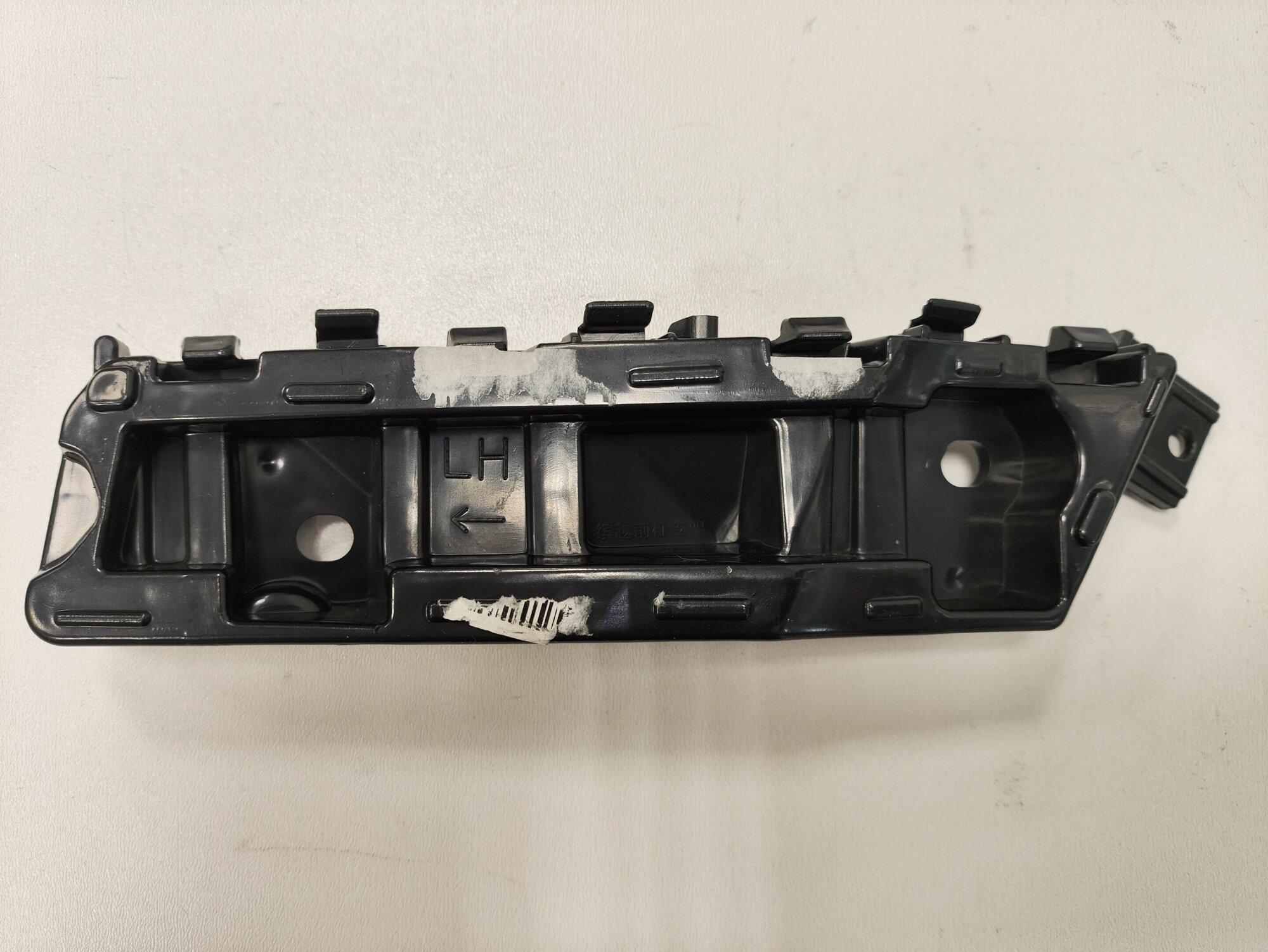 Кронштейн бампера переднего левый Geely Coolray [1.5 12V 7AMT внедорожник] 6010085800