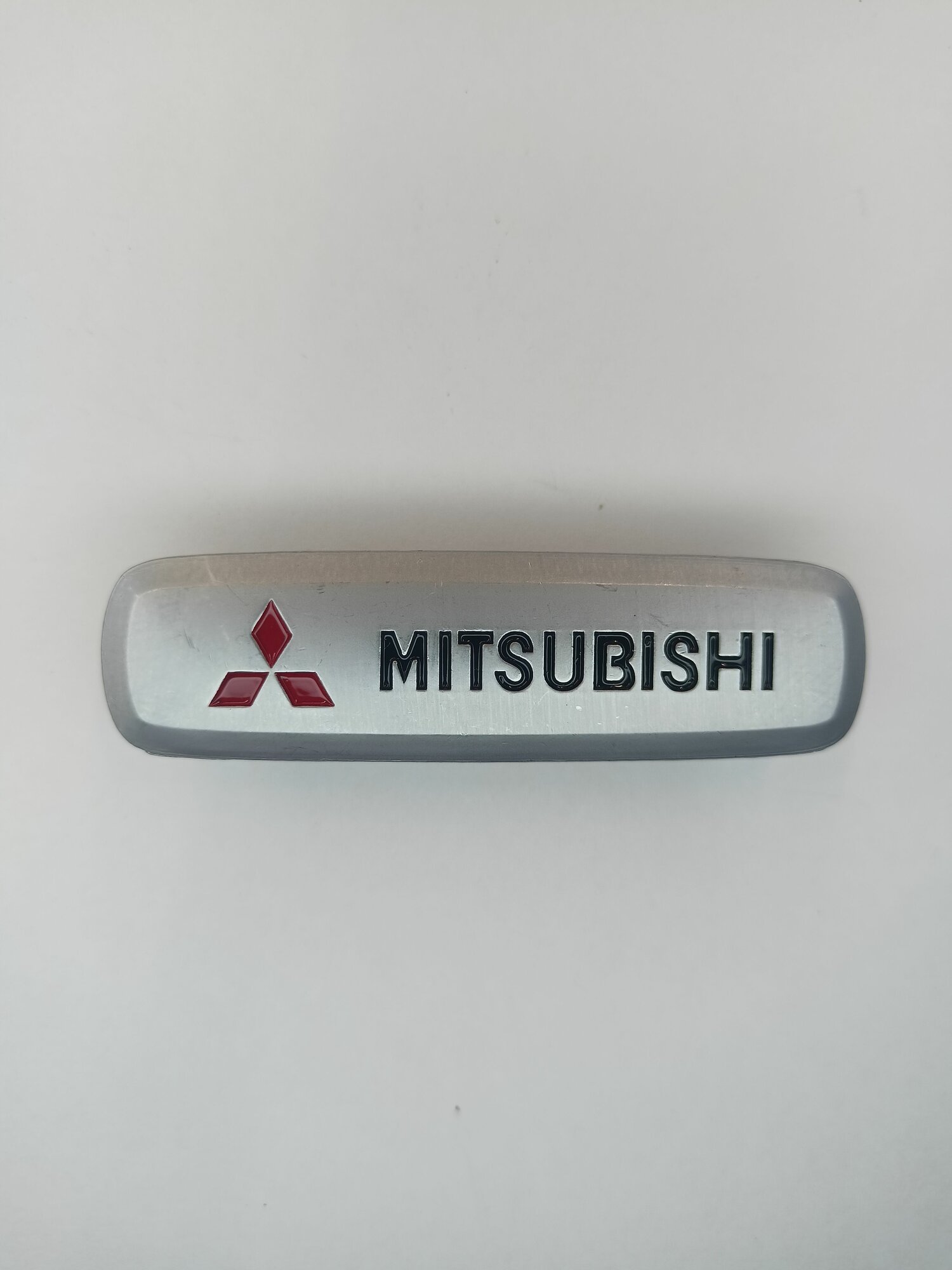 Логотип с маркой автомобиля для ЭВА ковриков Mitsubishi