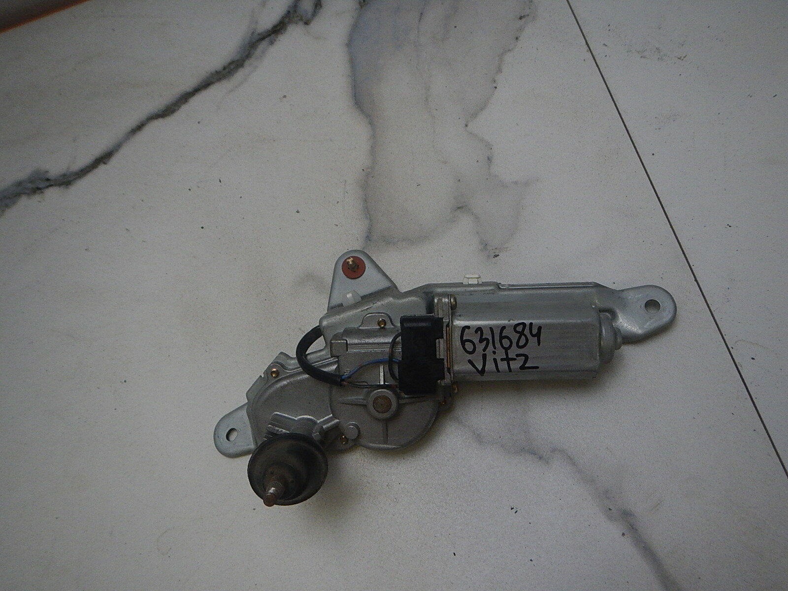 Б/У Моторчик стеклоочистителя задний, Toyota (Тойота)-VITZ (99-03) TOYOTA VITZ (99-03) Без видимых повреждений. 631684 T...