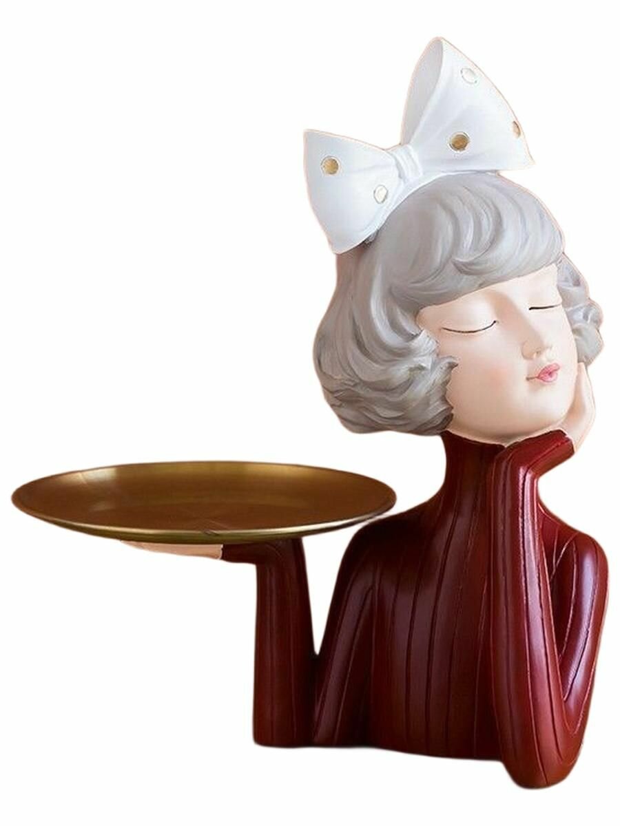 Статуя девушки с бантом