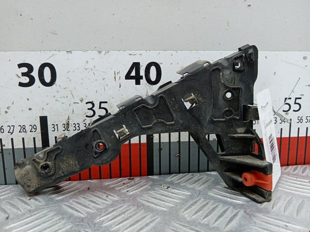 Кронштейн (крепление) переднего бампера левый Opel Astra H 24460283 арт. 2109205