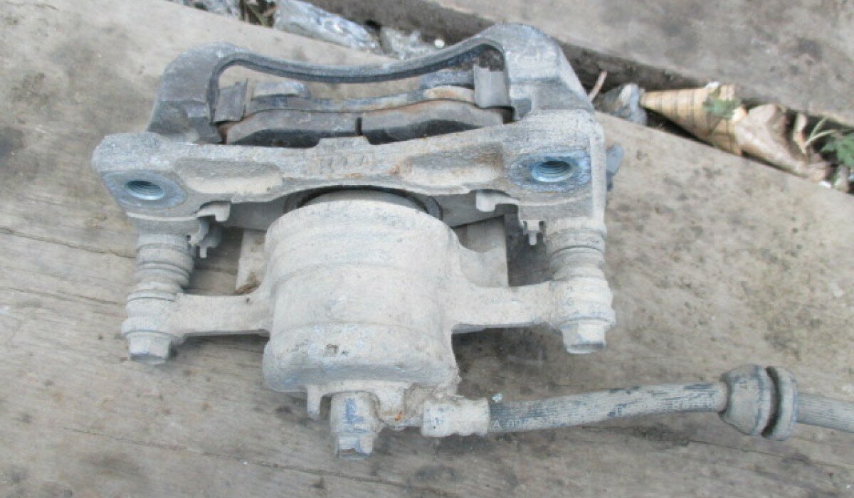 Суппорт передний Aveo (T250) Chevrolet 96534637