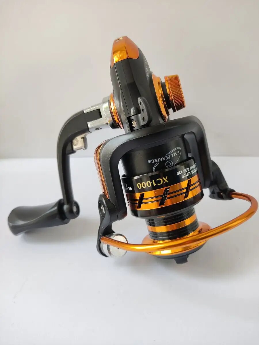 Катушка безынерционная FISHING MASTER XC1000, лесоёмкость 0,15-0,2 мм/м