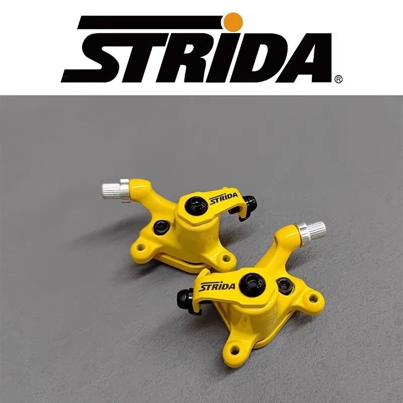 Желтые тормозные суппорты Strida