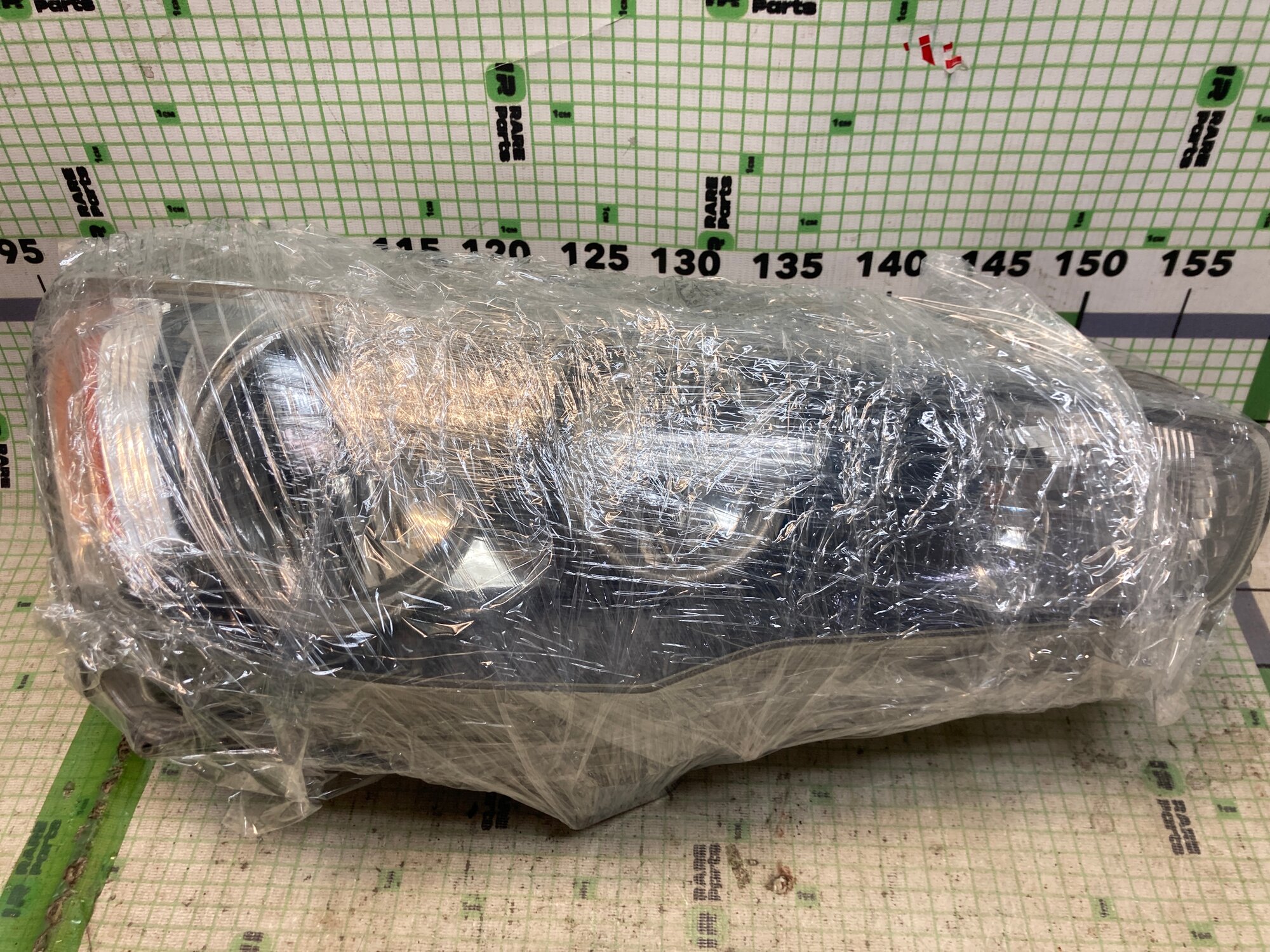 Фара левая Mitsubishi Lancer X