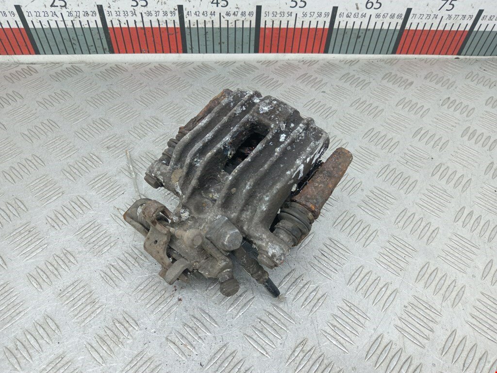 Суппорт задний левый Volkswagen Golf 4 1J0615423G арт. 2209666