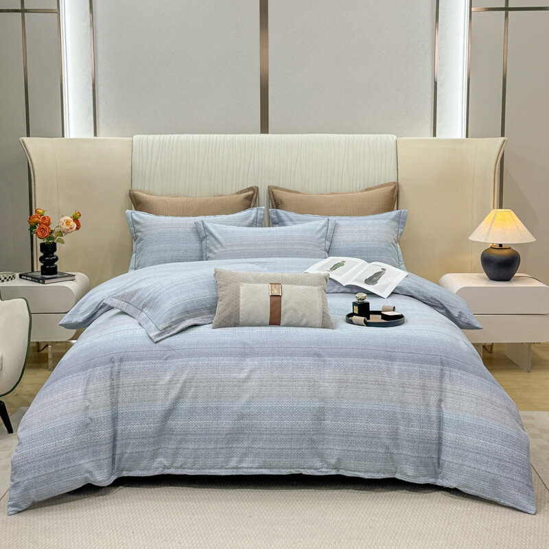 Осенне-зимний четырехпредметный комплект простого утепленного постельного белья из полиэстера и хлопка с принтованными простынями и пододеяльником от Nantong Home Textiles.