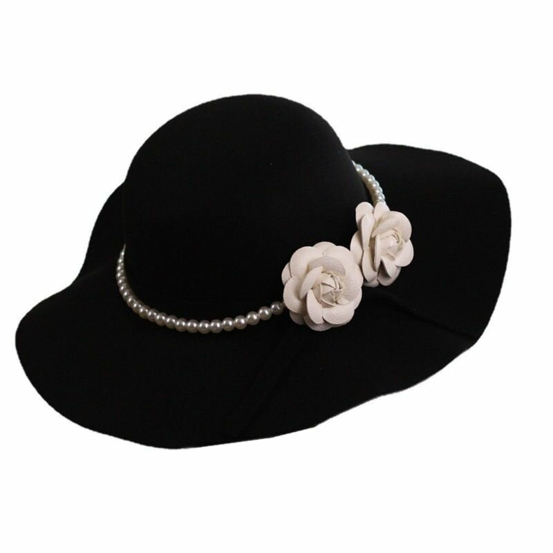 Черный цилиндр с жемчужным цветком