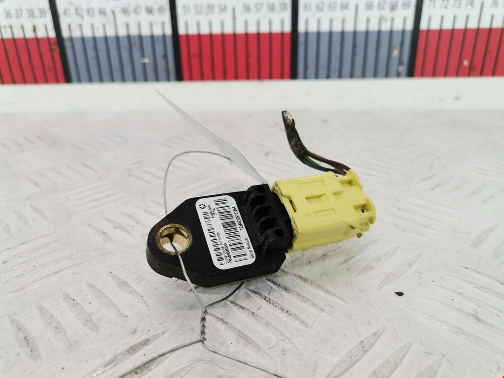 Датчик удара Dodge Nitro 04896065AA арт. 1745074