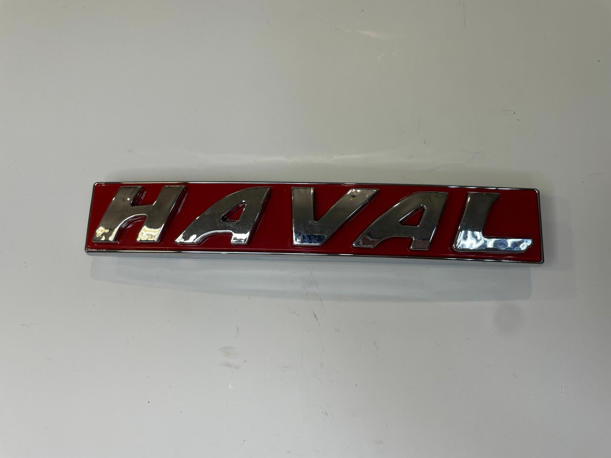 Эмблема передняя "Haval" Haval H6 [1.5 16V 6MT внедорожник 4X4 бензин] 3921011XKZ36A