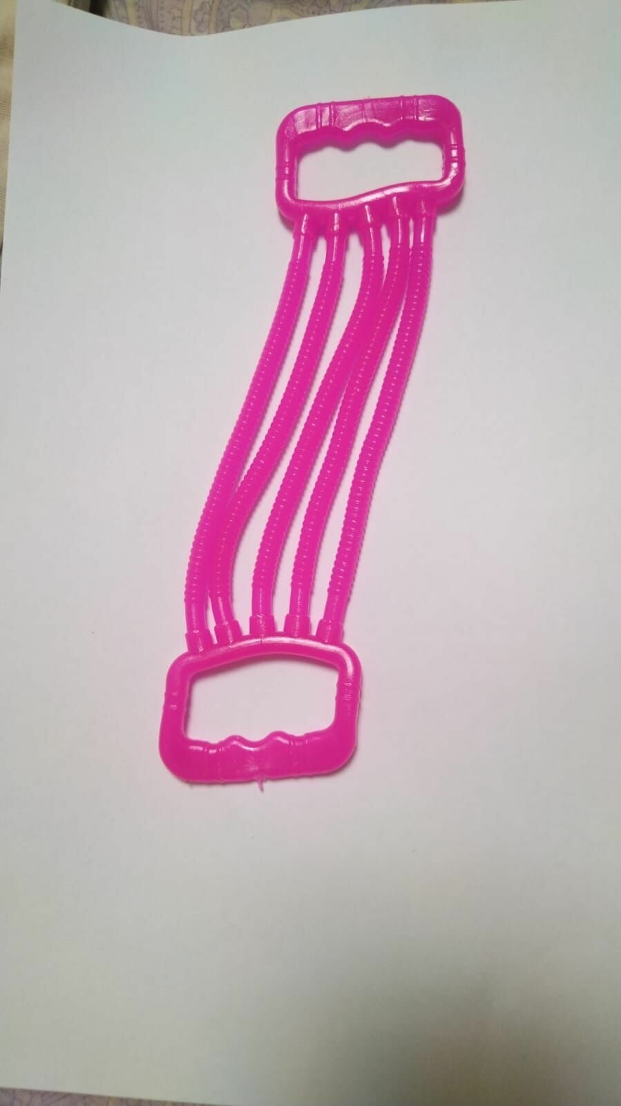 Детский антистресс-эспандер розовый