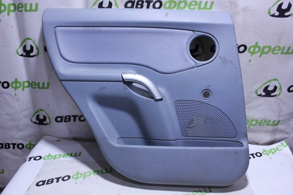 Обшивка двери задней левой CITROEN C3 2002-2009 9330E8