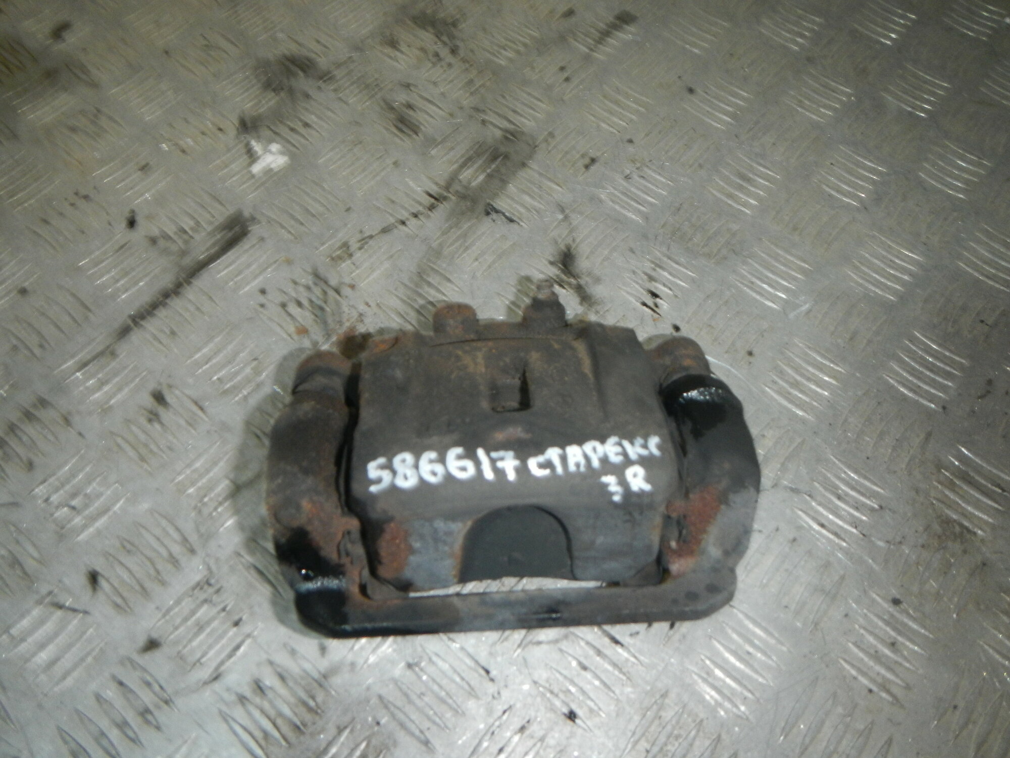 Б/У Суппорт задний правый, Hyundai (Хендэ)-GRAND STAREX/H1 (07-) HYUNDAI GRAND STAREX/H1 (07-) Обгорел. 586617 Hyundai-K...