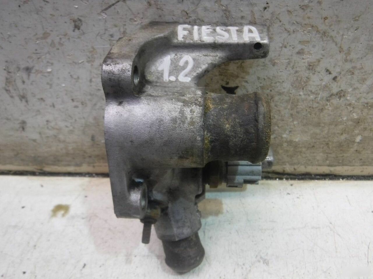 Фланец двигателя системы охлаждения Ford Fiesta Mk4 (1995—1999)