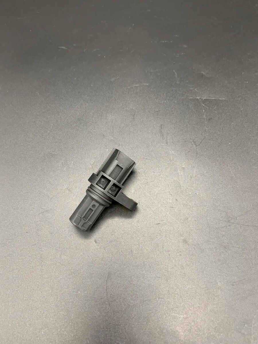 Датчик положения распредвала Новое