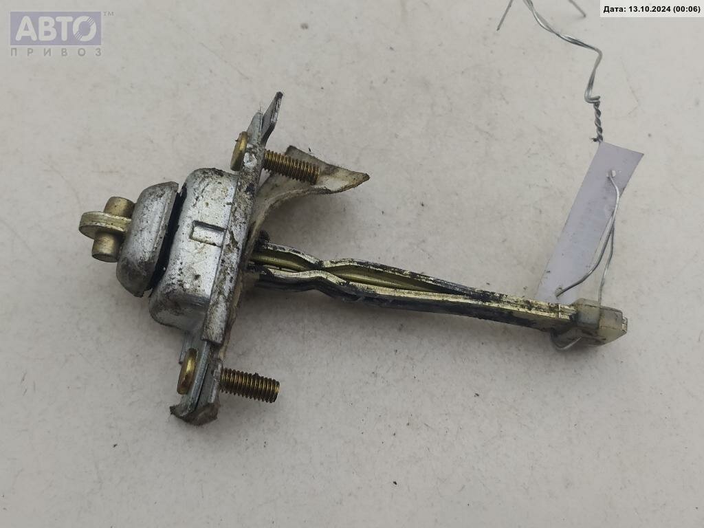 Ограничитель открывания двери передней Mazda 323P (1994-1999) BA