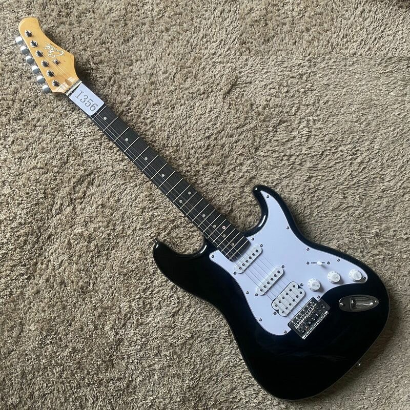 Электрогитара EKO ST, черная, SSH-звукосниматели, 6-точечный тремоло, 22 лада