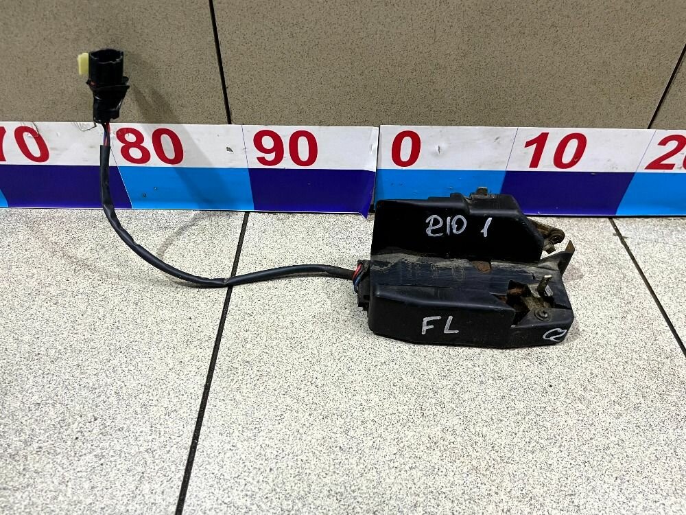 Замок двери передней левой Kia Rio I 0K30A59310B