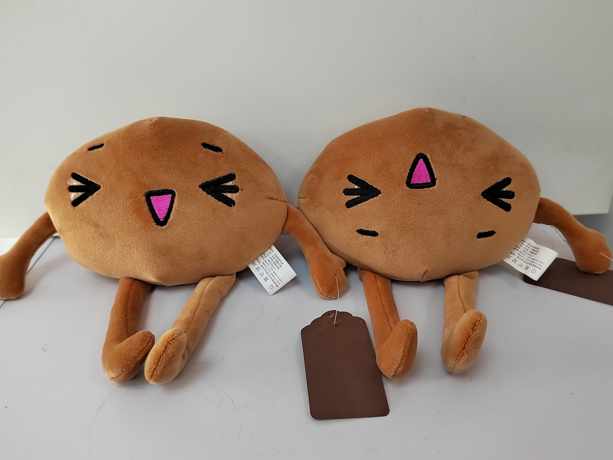 Игрушка мягкая косточка смайл