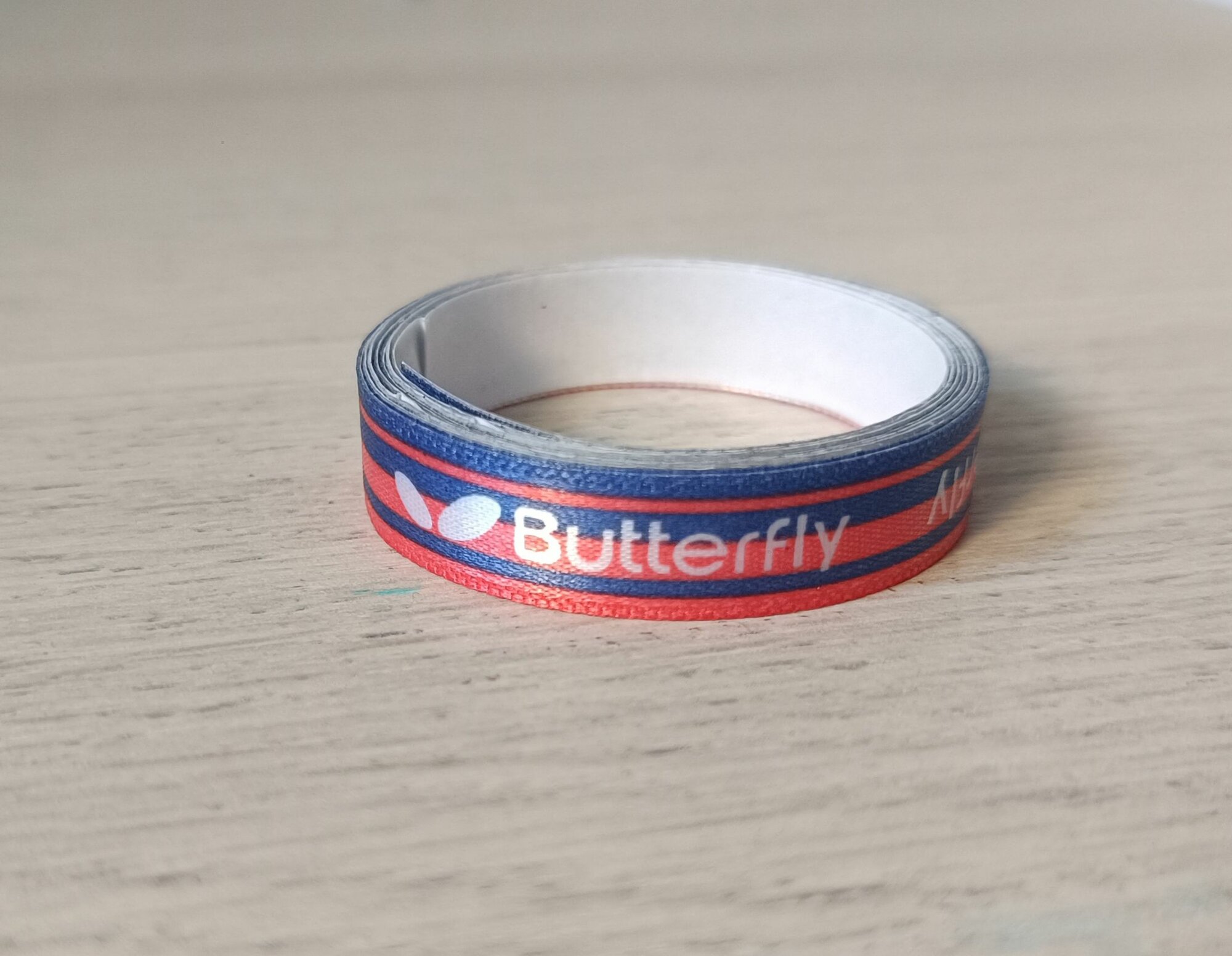 Торцевая лента Butterfly для ракетки настольного тенниса 1 метр / 10 мм (синяя-красная)