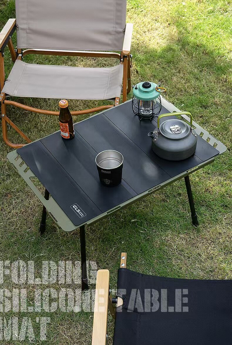 CLS outdoor folding table mat. It is a waterproof and heat - insulating silicone - made tablecloth that is moisture - proof and non - slip. Color: Black.