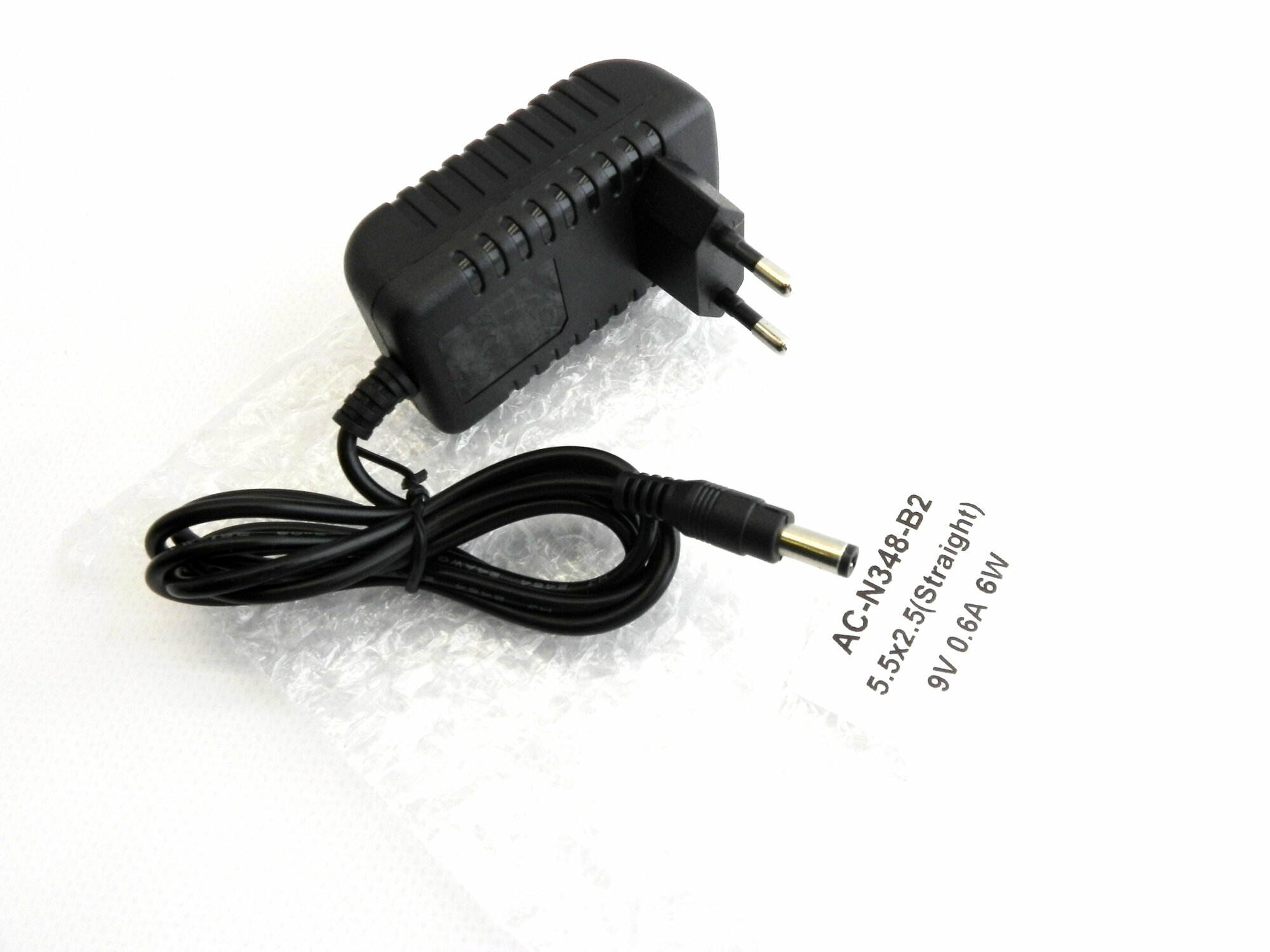 Универсальный блок питания для широкого спектра техники, весов 9V 0.6A 6W 5.5*2.5 прямой штекер