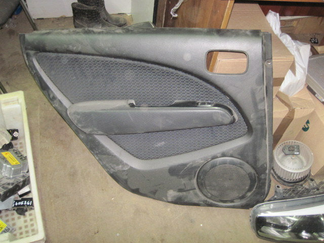 Б/У Обшивка двери задней левой, Mitsubishi (Митсубиси)-OUTLANDER (03-09) MITSUBISHI OUTLANDER (03-09) правый руль царапин...