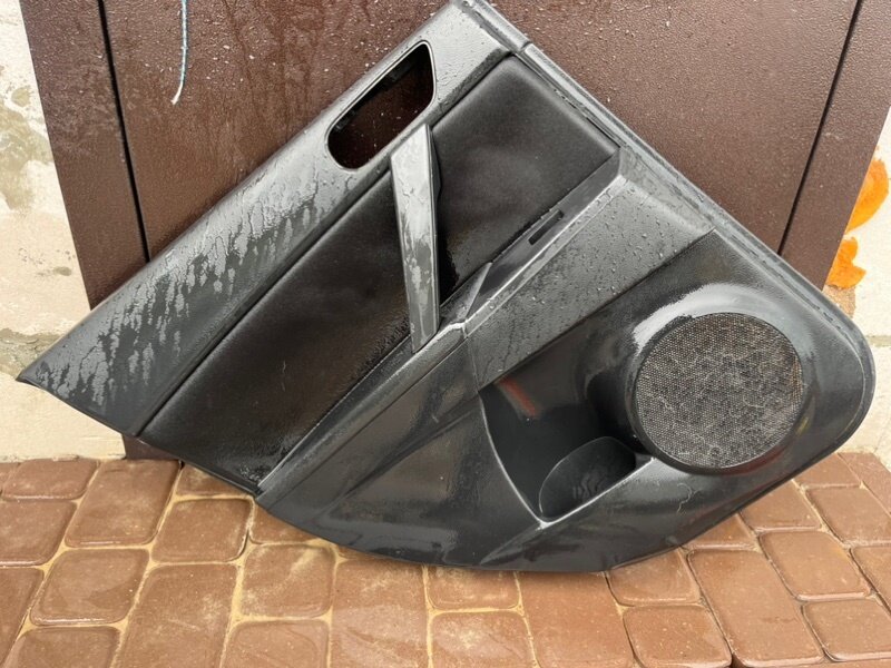 Обшивка боковой двери задняя левая Mazda Mazda 3 BBM468537