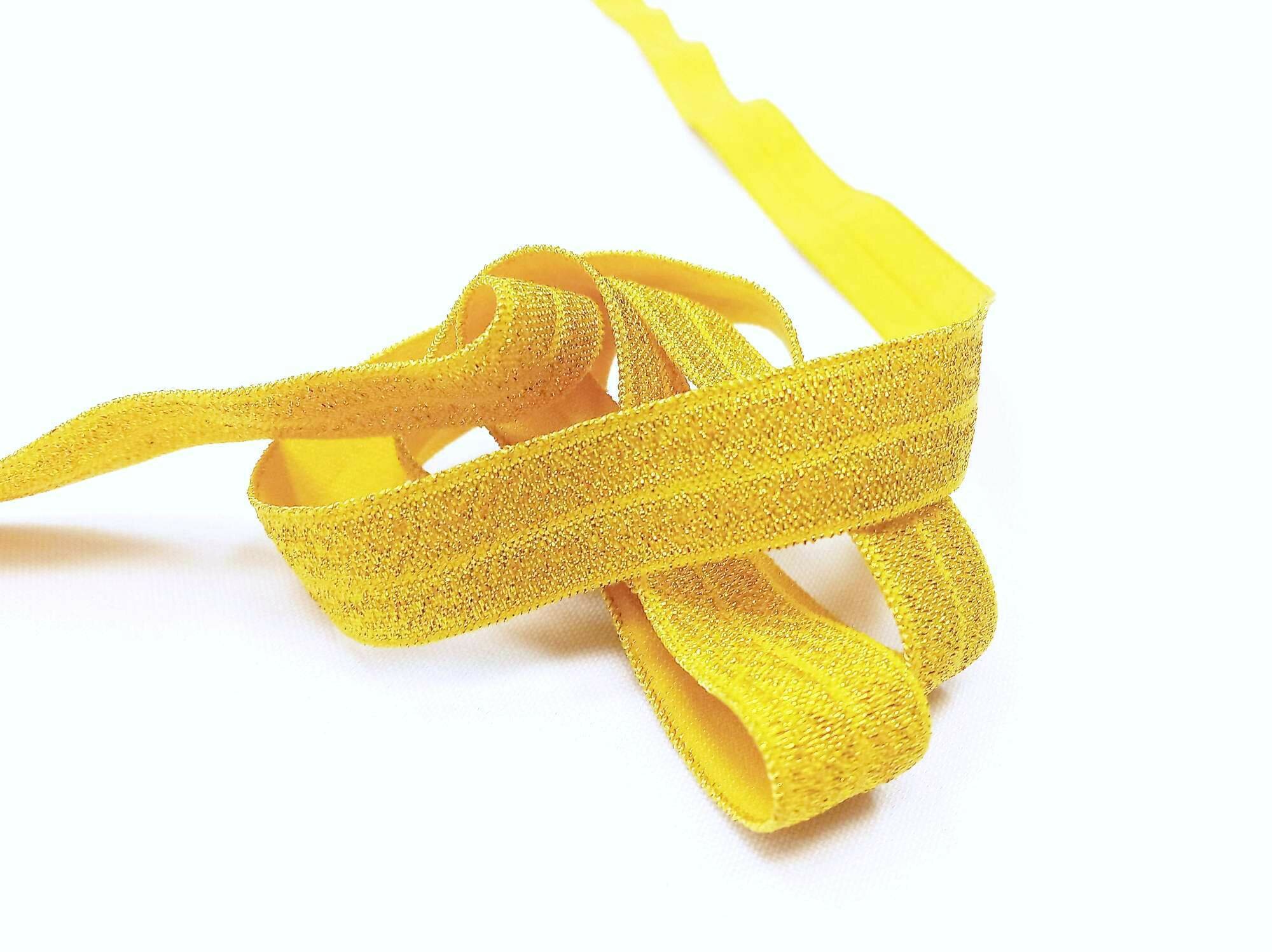 Резинка окантовочная (бейка эластичная) с люрексом 15мм золотая 5 м.