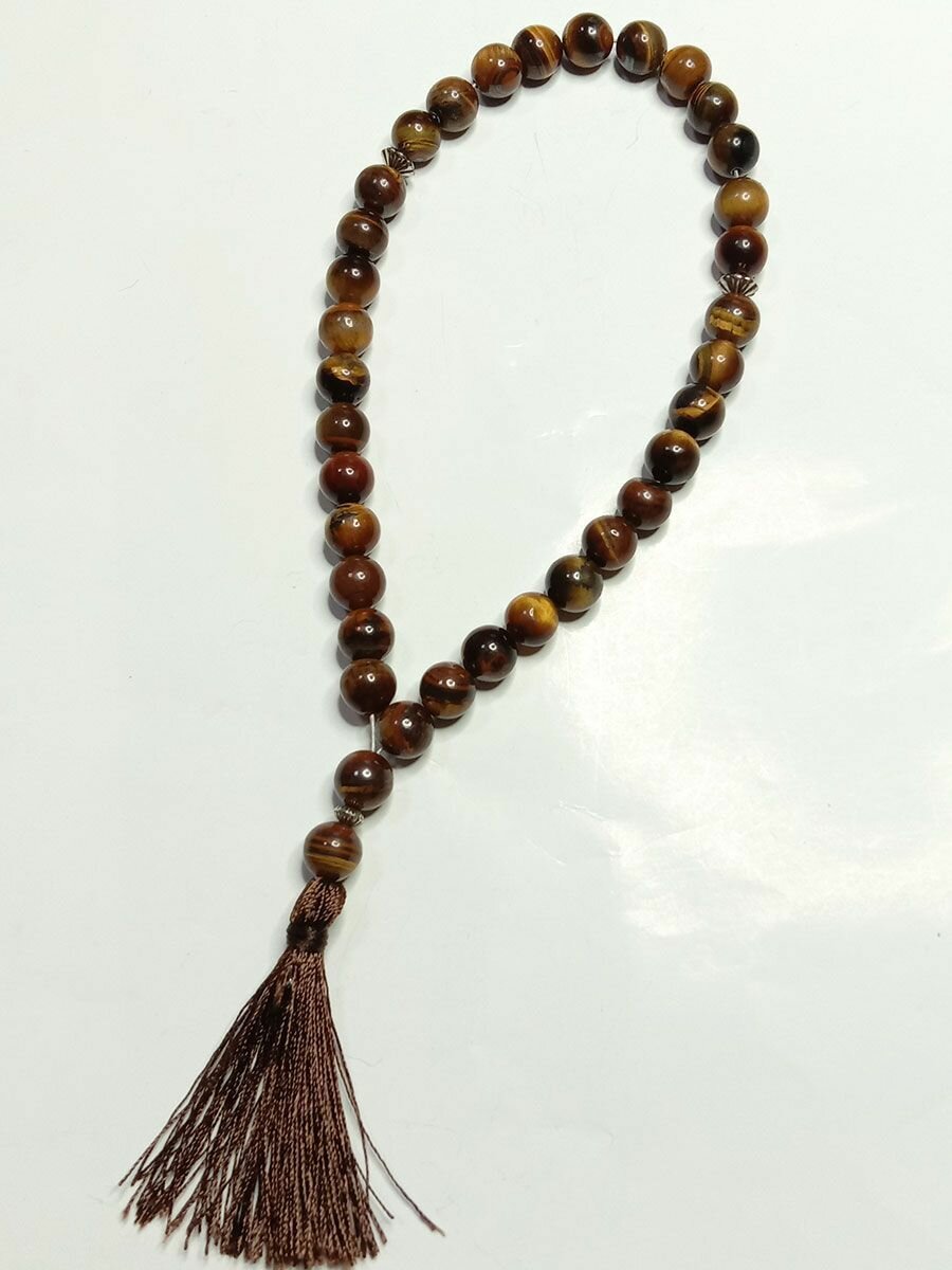 Четки из тигрового глаза 33 бусины. диаметр каждой бусины 8 мм.