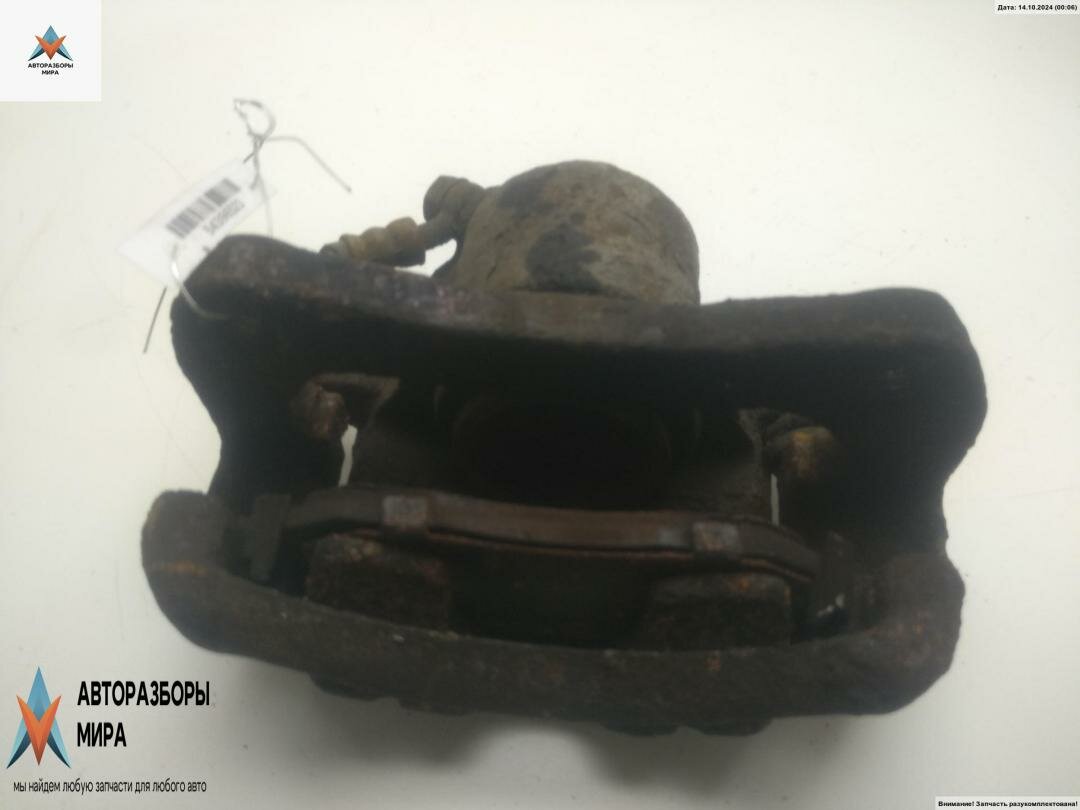 Суппорт передний левый Mitsubishi Colt 5 (CJO) 1999