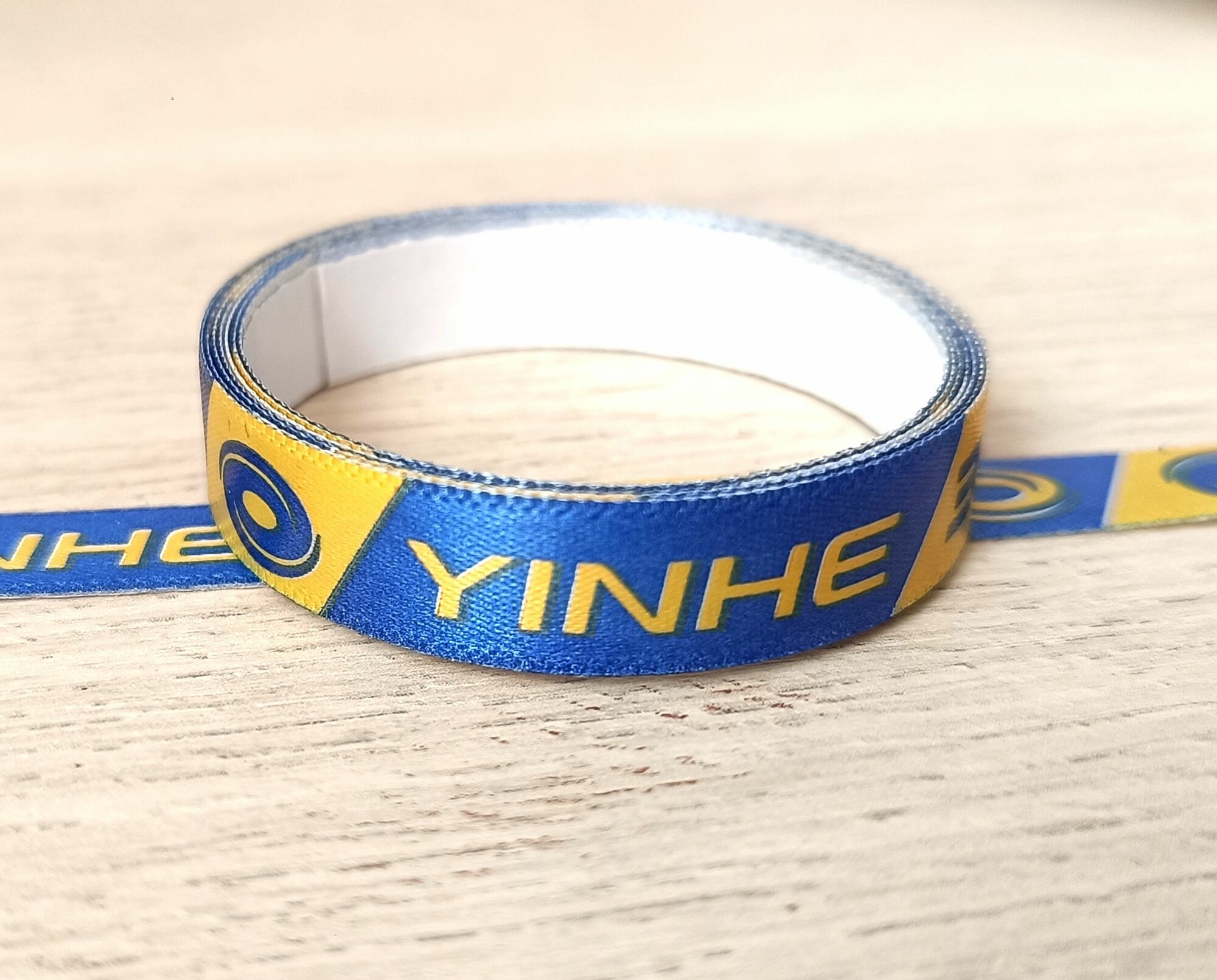 Торцевая лента Yinhe 1 метр / 10 мм - для ракетки настольного тенниса (синий - желтый)