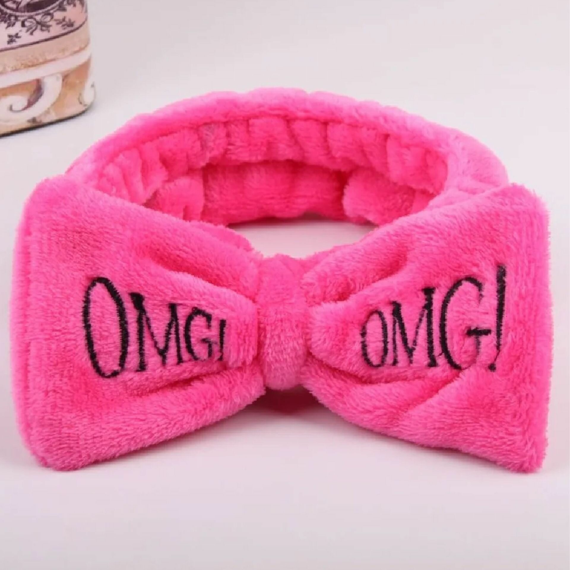 Повязка на голову женская косметическая с бантом OMG