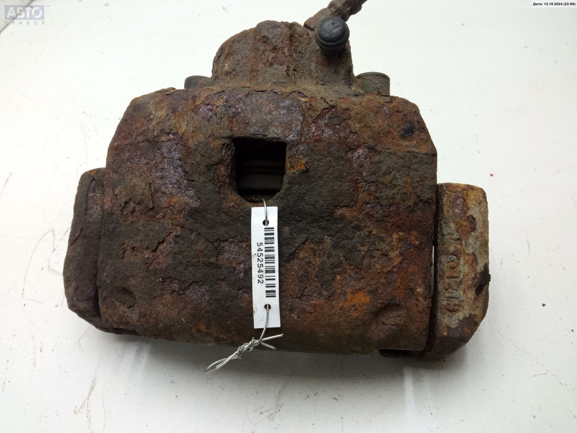 Суппорт передний левый Mazda Tribute