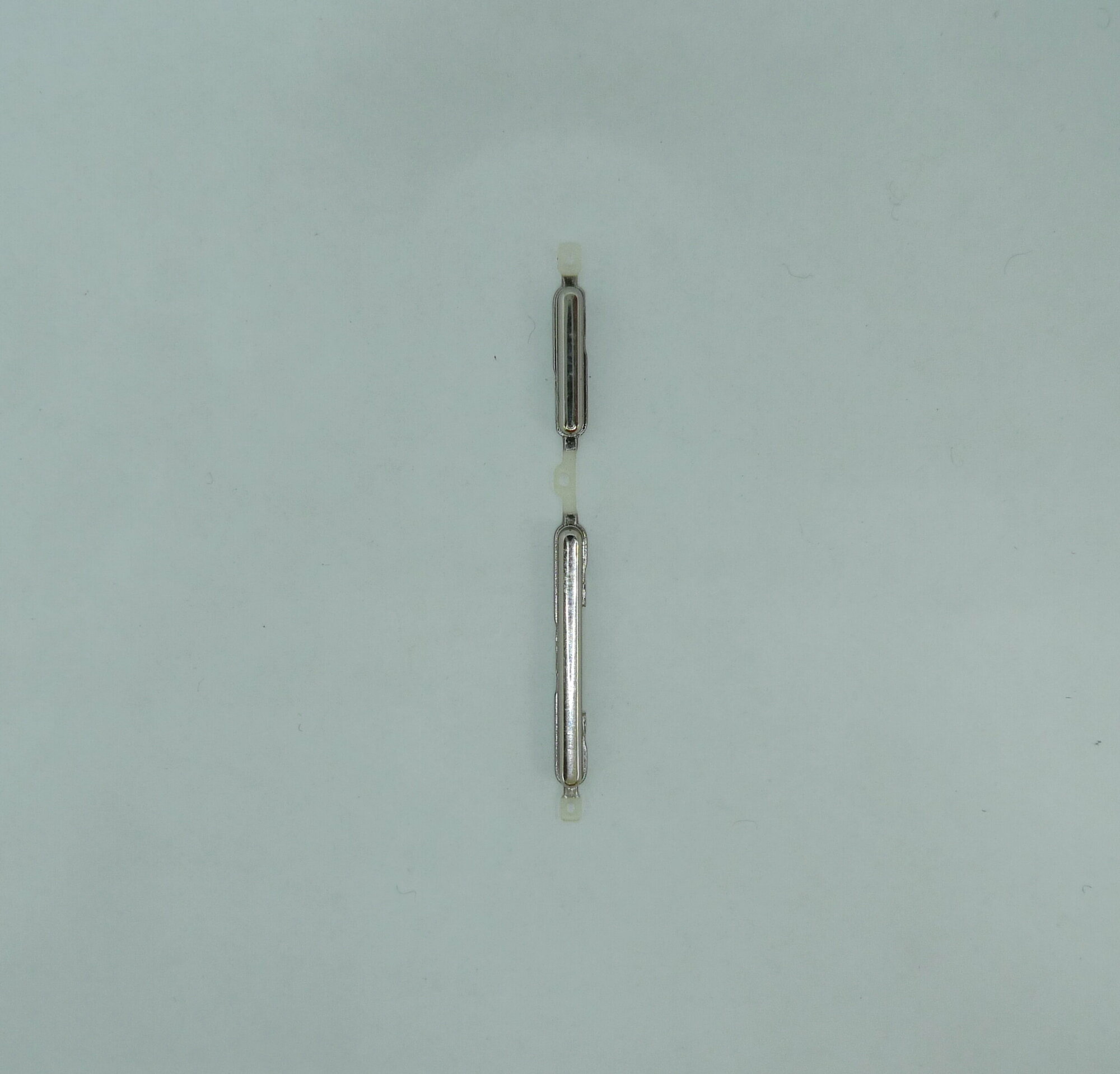 Толкатель кнопок включения, громкости Honor 7А (серебро) (снятый, оригинал)