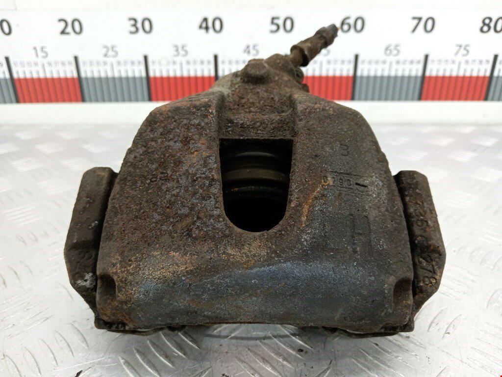Суппорт передний левый Ford Focus 2 1682876 арт. 1889105