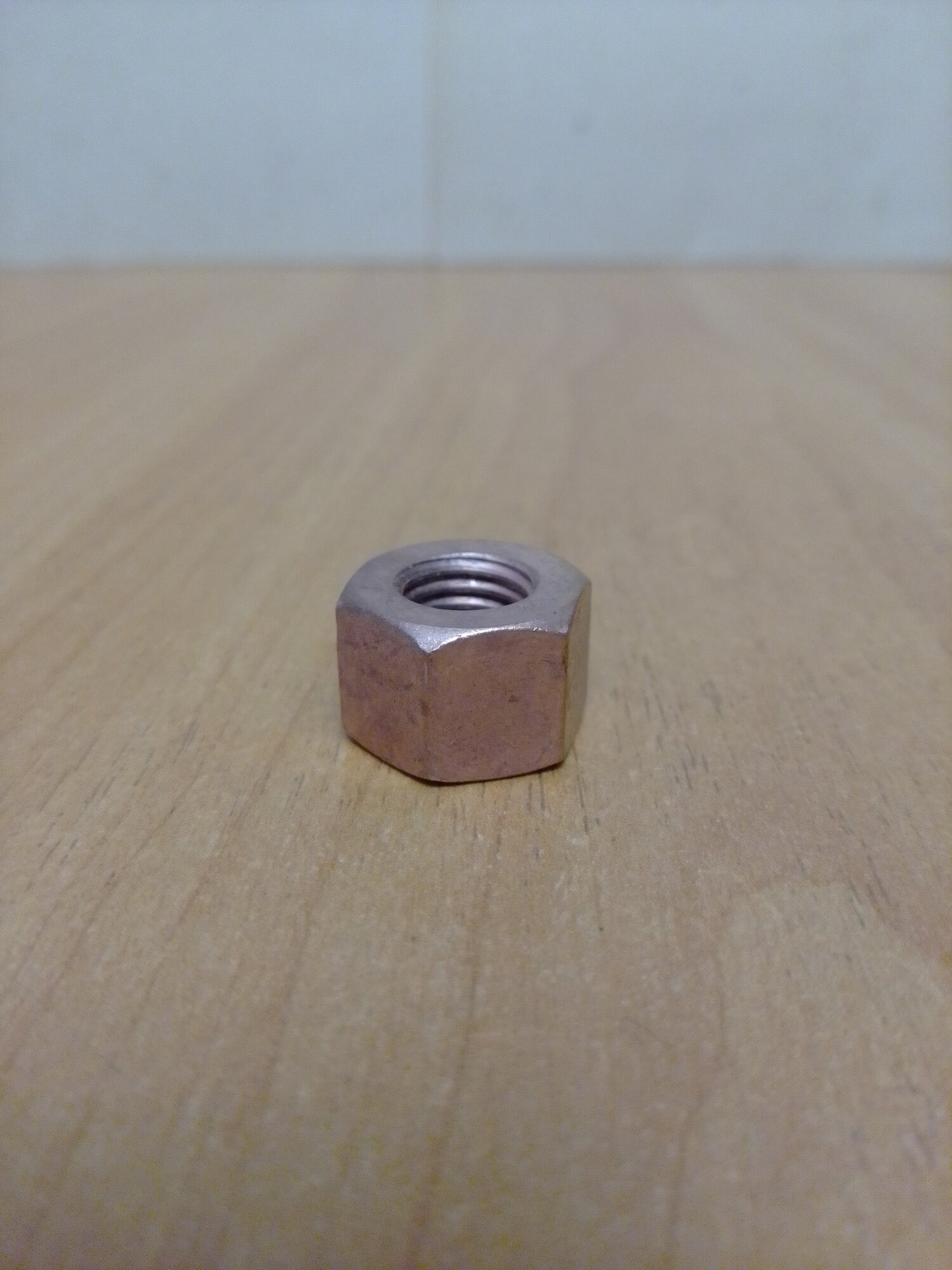 Гайка М10х1.5 омеднённая приёмной трубы, коллектора ключ 17. Высота 12 мм. Россия, Красная Этна. 250512-п5
