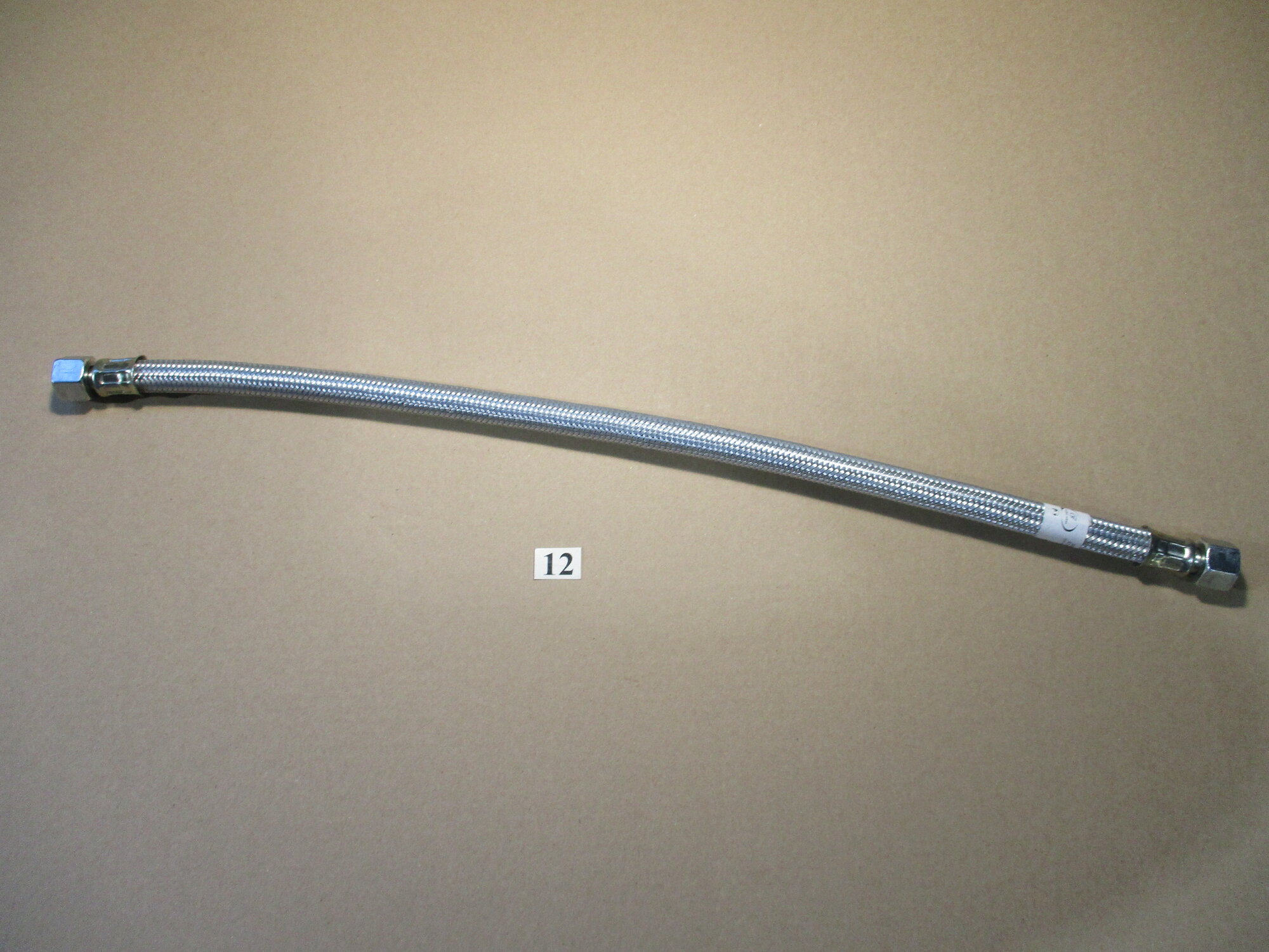 Шланг тормозной КамАЗ в мет. опл. L=640мм (гайка/гайка,24)