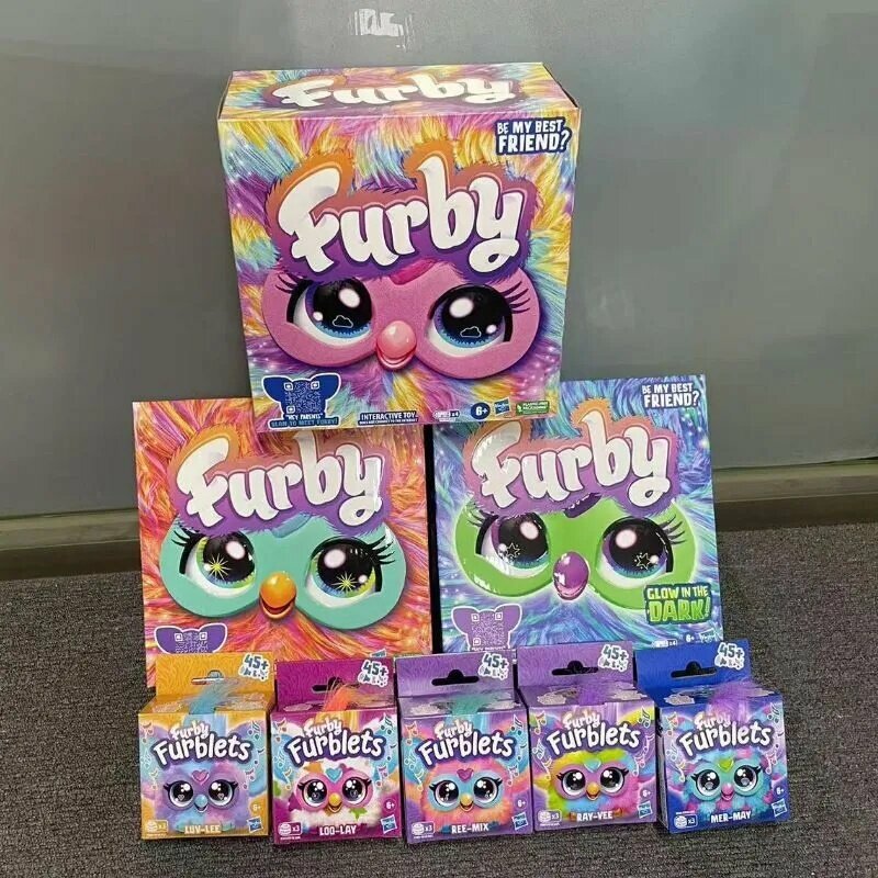 Ферби Hasbro Furby Furblets Ray-Vee / Детская плюшевые интерактивная игрушка с фиолетовыми волосами и пряжкой для ключей, подходящая для подарок на день рождения детям от 6 лет и старше.