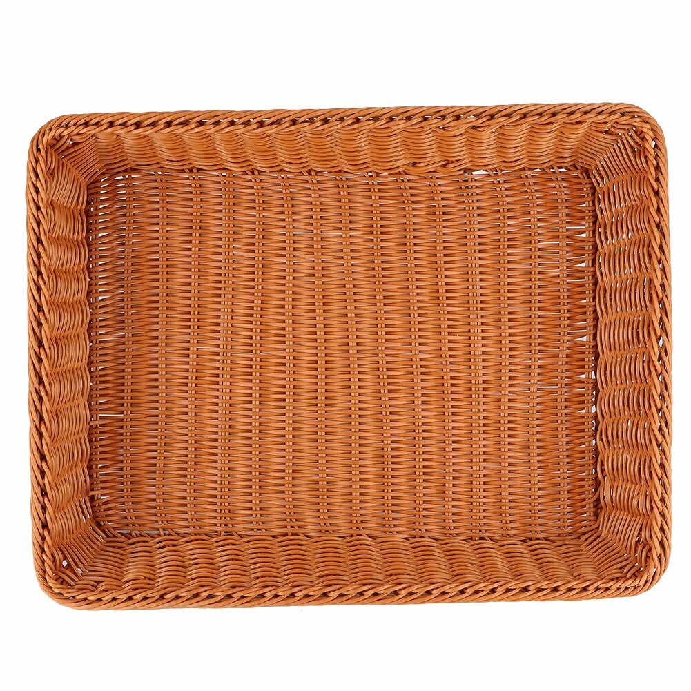 Корзина для хранения хлебных фруктов на рабочем столе.