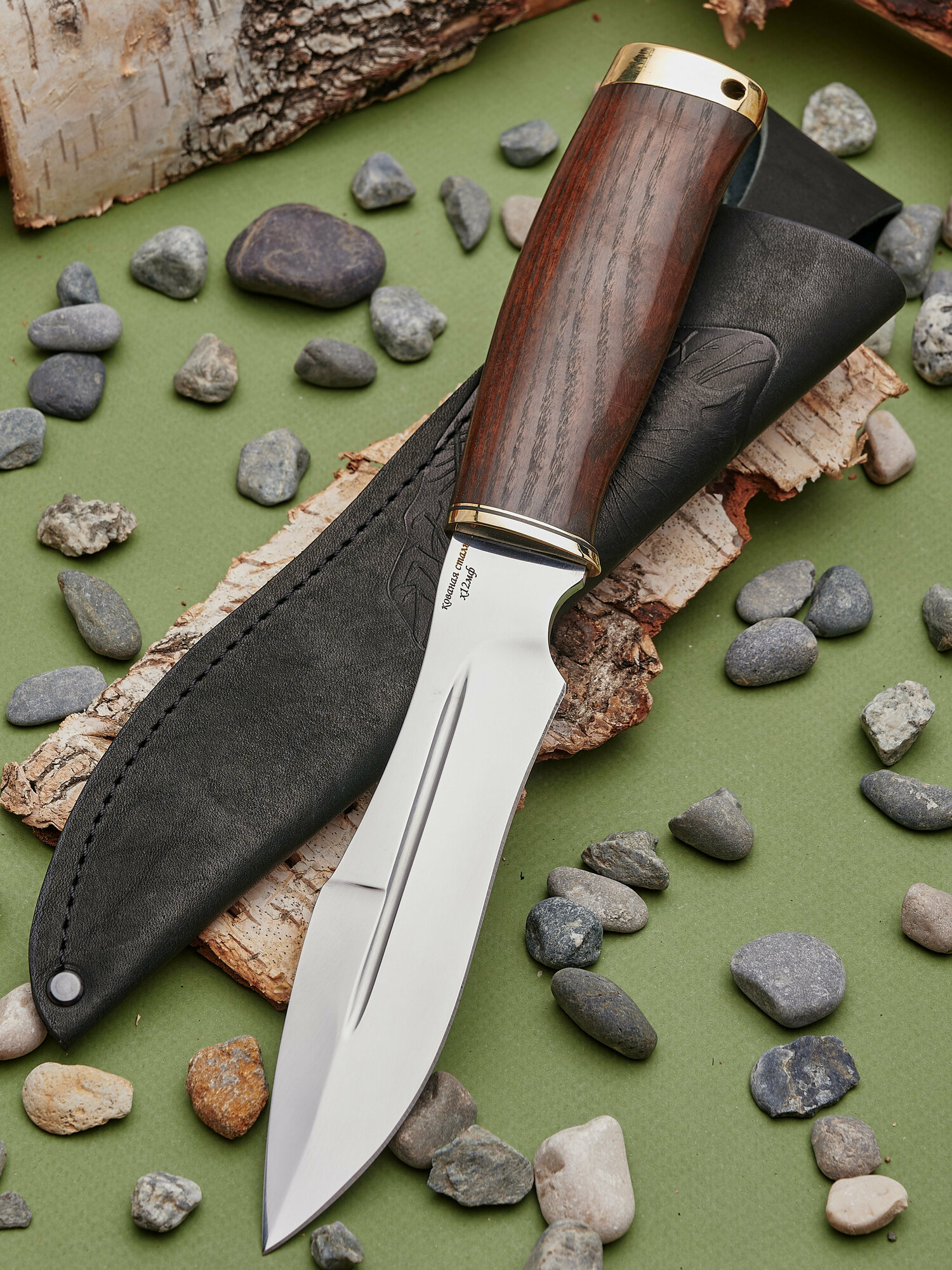 Разделочный нож из кованой стали х12мф ручной работы с кожаным чехлом