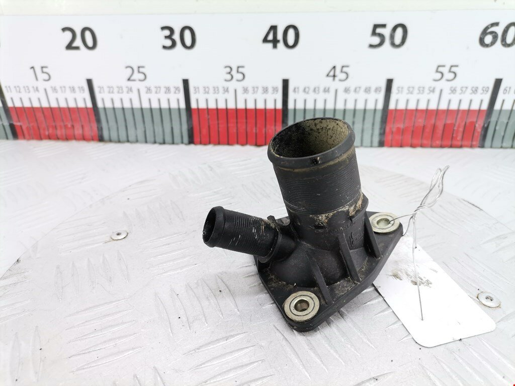 Корпус термостата Peugeot Partner 1 1336C9 арт. 1611535