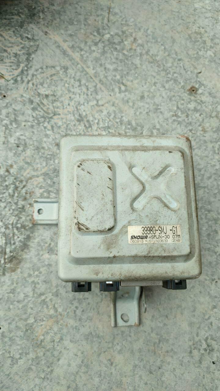 Блок управления электроусилителя руля Honda Civic 8 (2005 - 2008) 39980SMJG1