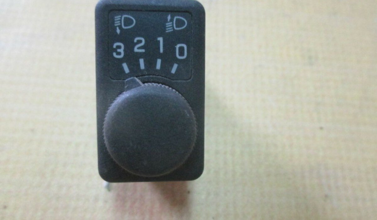 Кнопка корректора фар Primera P12E Nissan 25190AV600