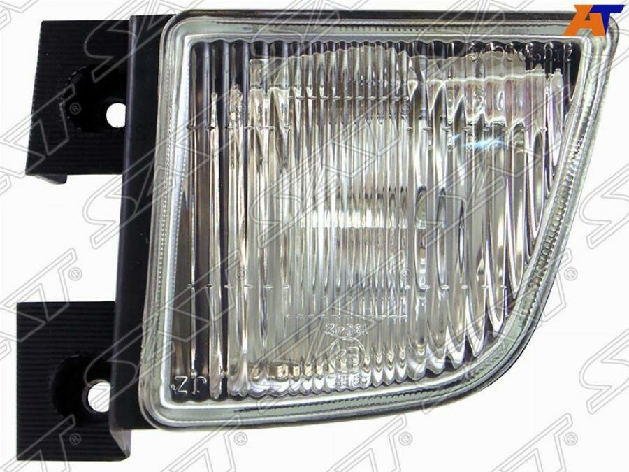 SAT ST-212-2010L Фара противотуманная (Слева) Toyota Hiace 89-04 / Carina E 92-96