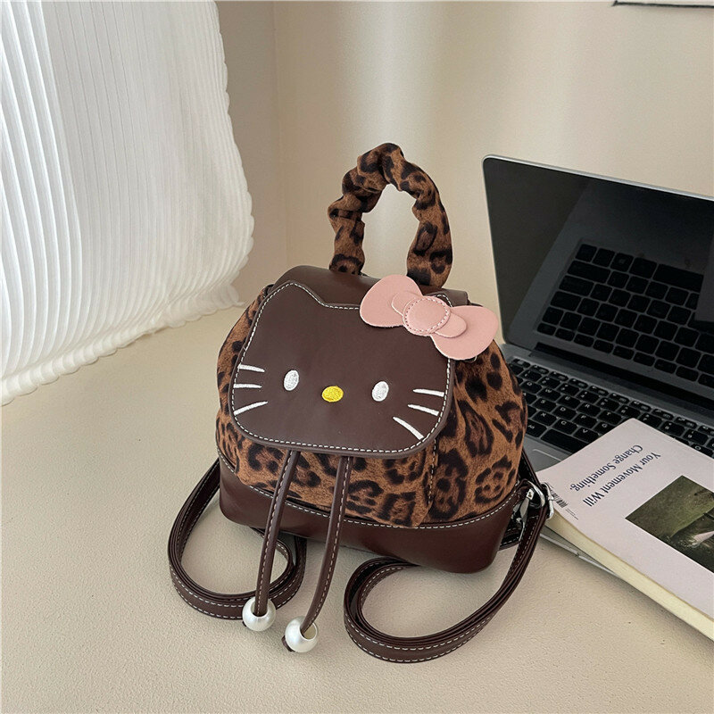 Cat mini backpack with nylon material and butterfly knot for daily use, coffee