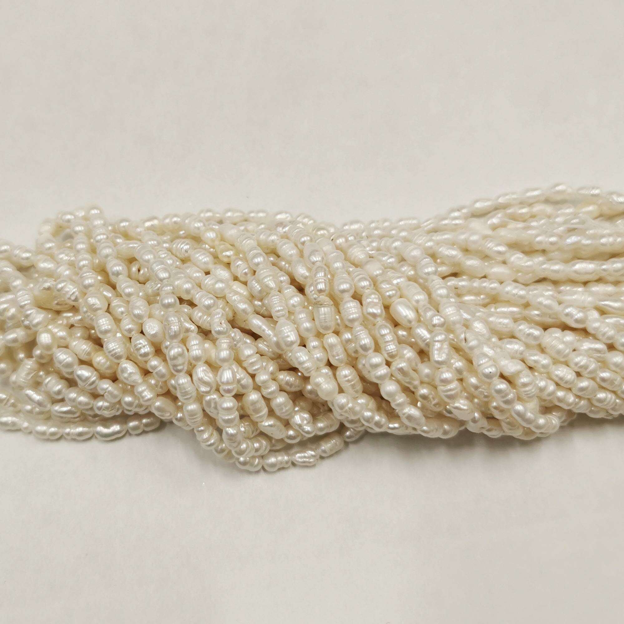 Бусина из жемчуга, 4х3-9х4мм, барокко, рис, белый, 50-70 шт, низка