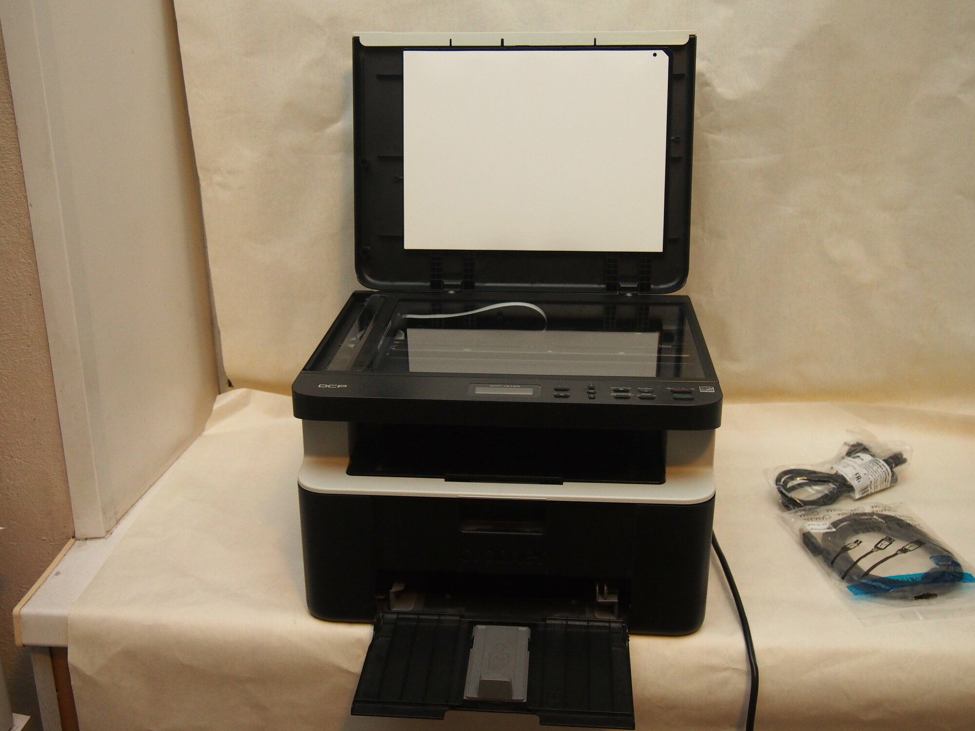 Brother DCP1512R All-in-One - перезаправляемое лазерное МФУ